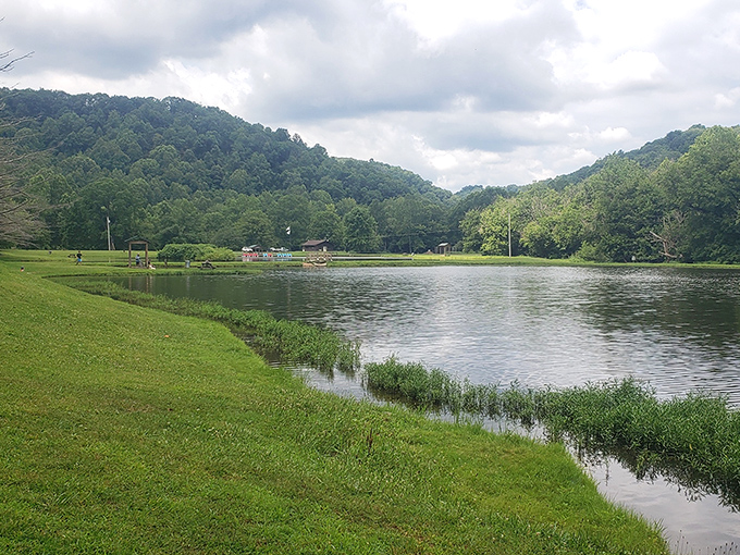 The serene lake at Cedar Creek reflects the surrounding hills like nature's own Instagram filter.