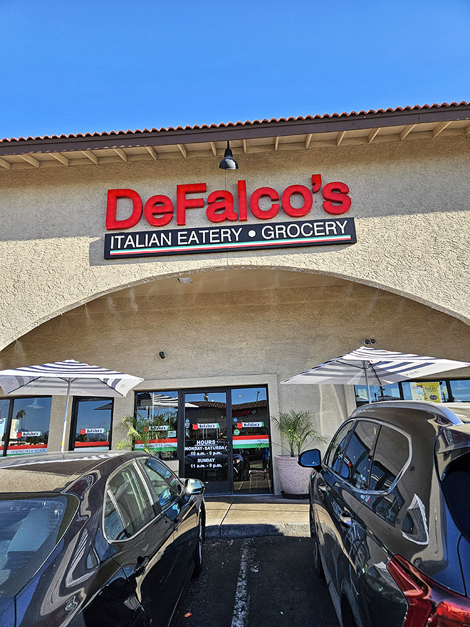 Those welcoming umbrella-shaded tables at DeFalco's practically whisper, "Sit down, eat something wonderful, stay awhile."