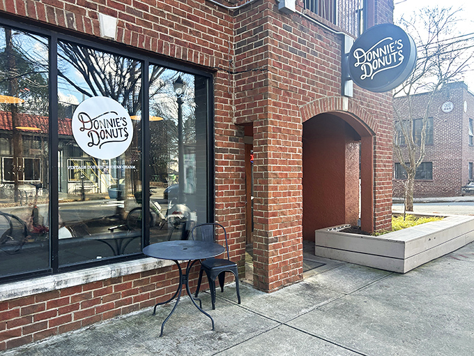 The rustic charm of Donnie's brick exterior houses sweet secrets within. A neighborhood gem hiding in plain sight.