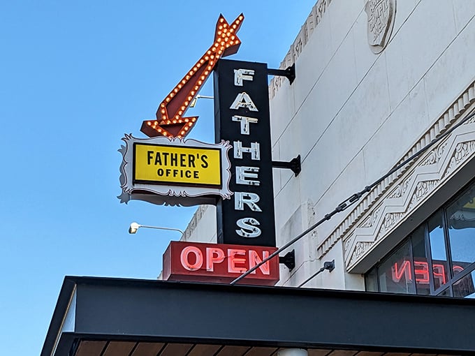 That illuminated arrow at Father's Office points the way to burger enlightenment. The neon "OPEN" sign might as well say "Your taste buds' vacation starts here."
