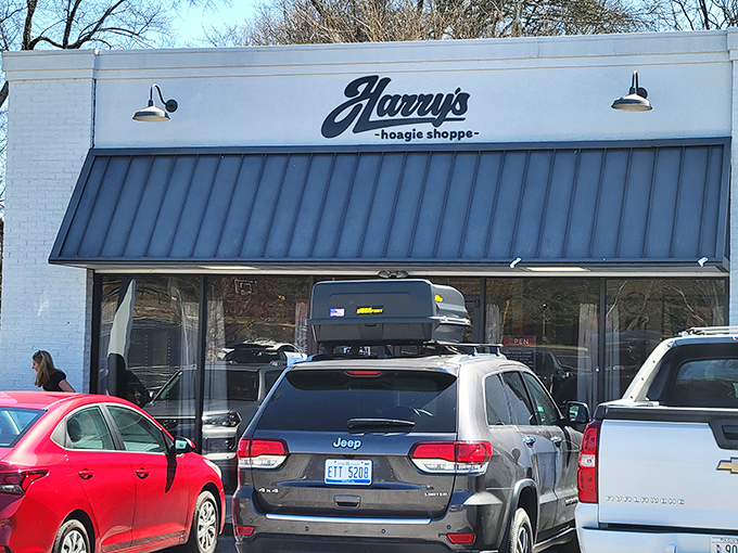 Blue awning, white building, sandwich perfection. Harry's is the architectural equivalent of "less talk, more action."