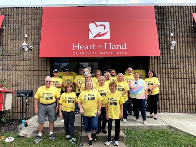 Heart and Hand Outreach: "Team yellow to the rescue! These volunteers transform donations into dignity and support for neighbors in need."