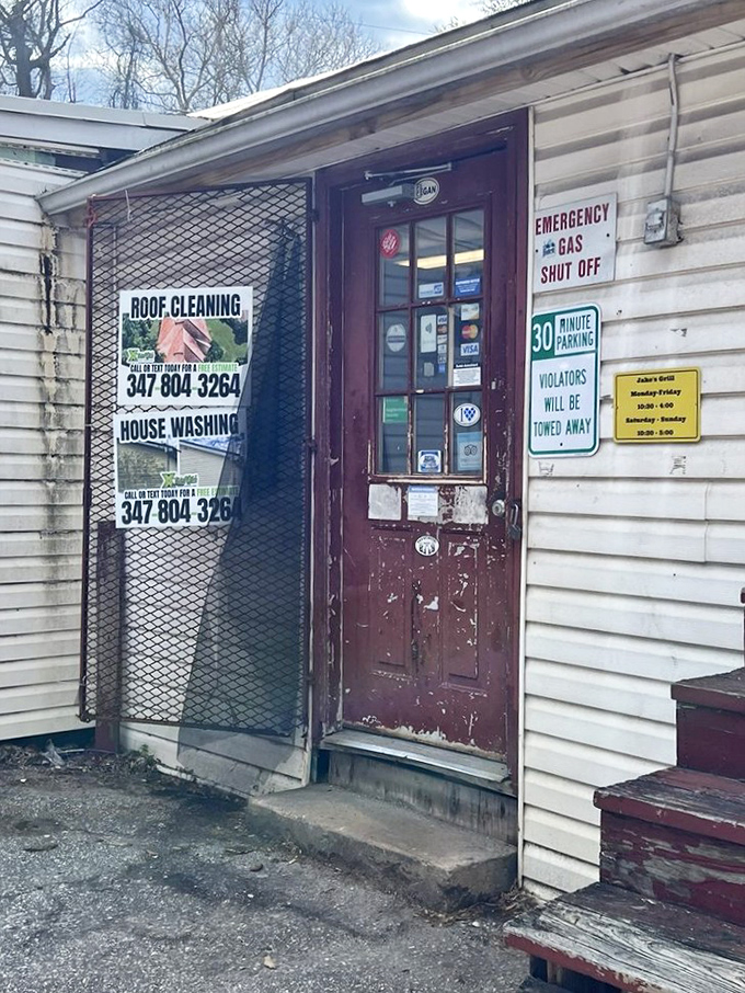 The weathered door at Jake's has welcomed barbecue pilgrims for years. Behind it lies meat magic that defies the humble surroundings.