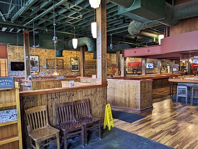 The rustic-meets-refined interior at Jim 'N Nick's proves great BBQ doesn't need paper plates to maintain its soul.
