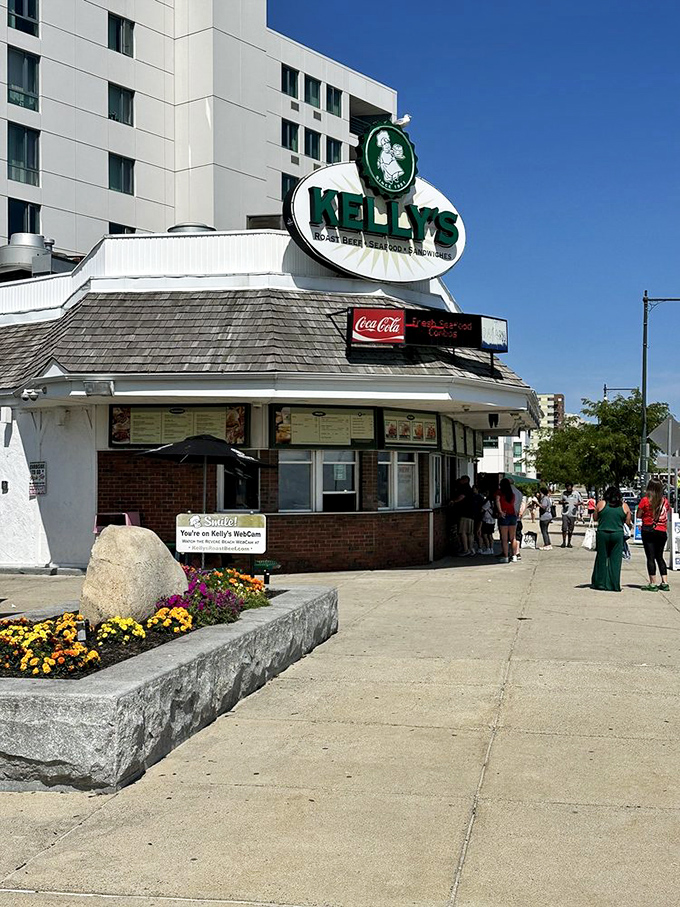 The sidewalk flowers add a touch of beauty, but let's be honest&mdash;you're here for what's sizzling behind those brick walls.