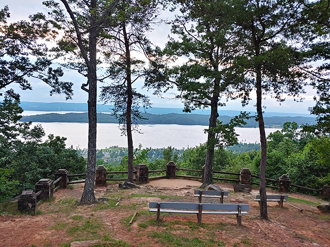 Sunset from this overlook transforms the Tennessee River into a ribbon of gold winding through emerald hills.