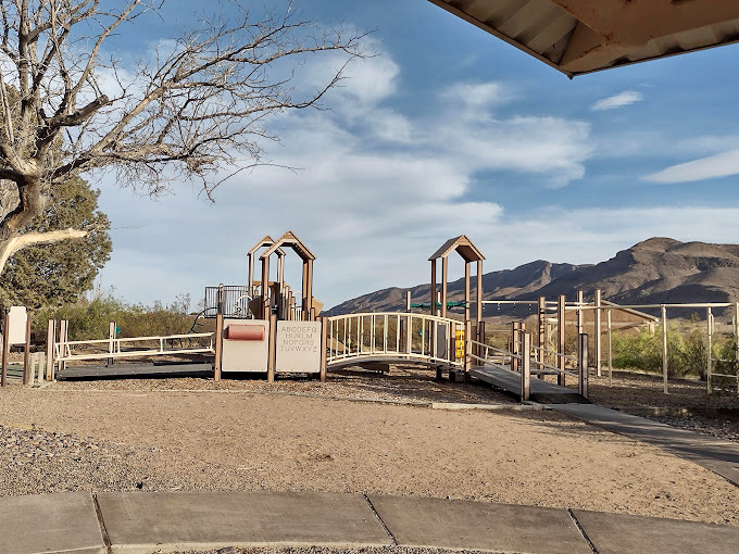 Kid-friendly adventures await at Leasburg Dam, where playground fun comes with spectacular mountain views.