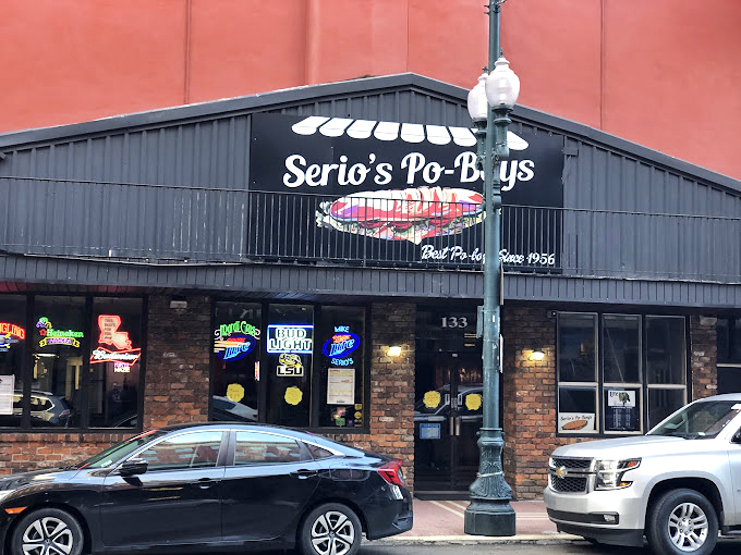 Brick walls and neon signs&mdash;the universal language for "legendary sandwiches served here since forever."