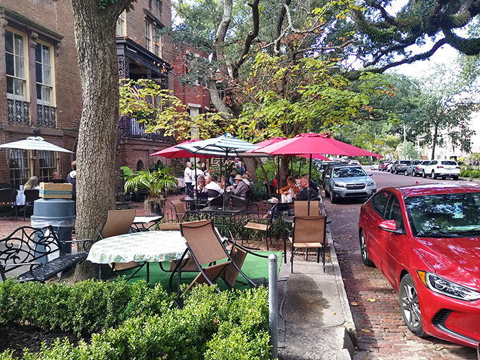 Dining al fresco beneath Savannah's storied trees. Mrs. Wilkes offers the perfect backdrop for conversations as rich as the food.