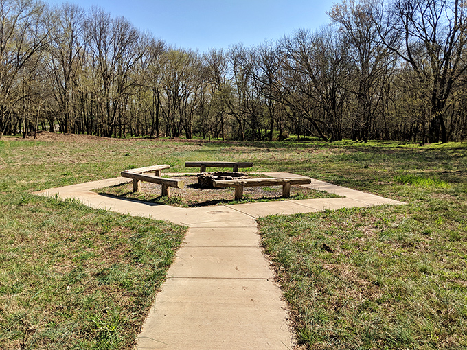 Simple benches around a fire pit &ndash; where the best stories are told and marshmallows meet their delicious doom.