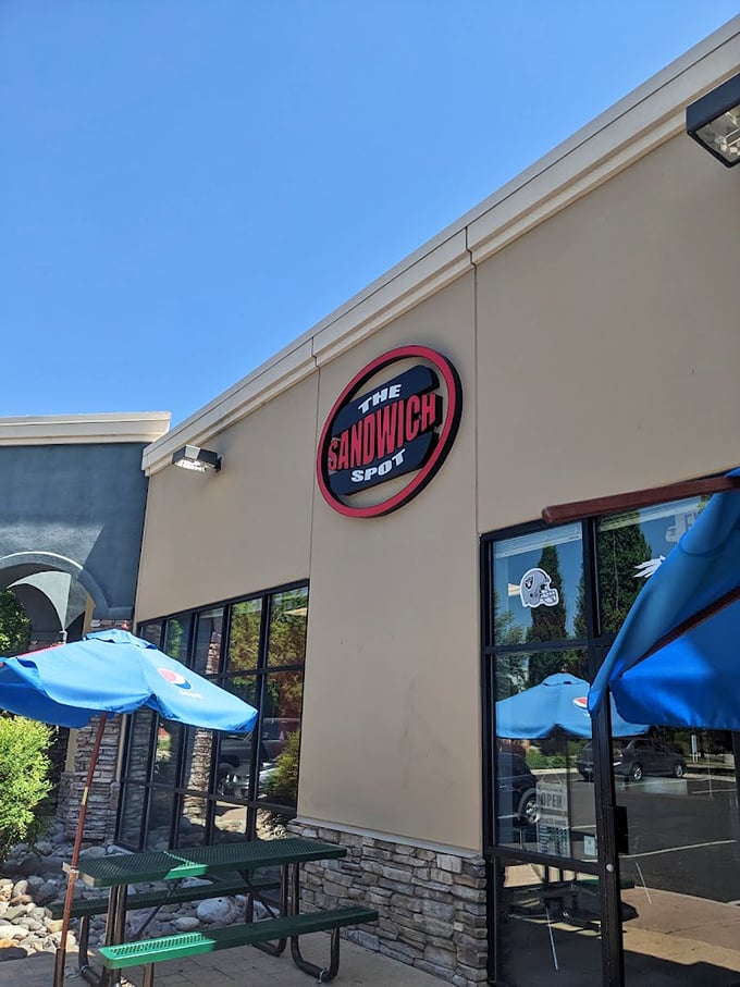 Blue umbrellas offer shade while you tackle The Sandwich Spot's creations &ndash; you'll need both hands and all your concentration.
