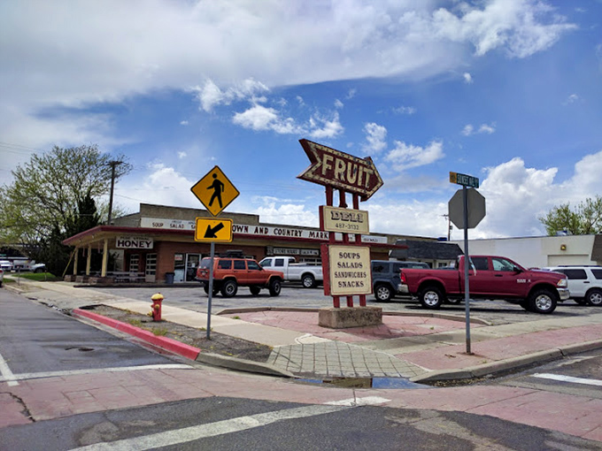That vintage "FRUIT" arrow sign points the way to sandwich salvation &ndash; where locals have been finding lunch nirvana since before TikTok was born.