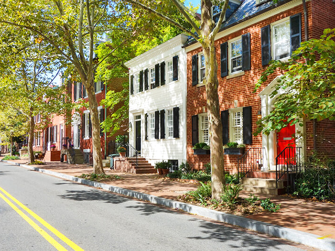 Woodbridge: Colorful townhomes reflecting in calm waters &ndash; suburban compromise for those unwilling to disconnect from urban amenities.