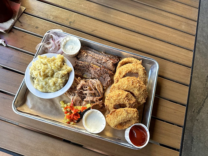 The two-meat platter with mac and cheese and pulled pork is the kind of meal that requires a nap afterward&mdash;and you'll dream about it.