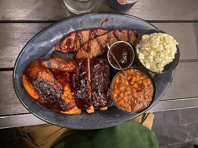 The three-meat platter doesn't just feed you&mdash;it transforms your entire outlook on life, making you wonder why you ever wasted time eating anything else.
