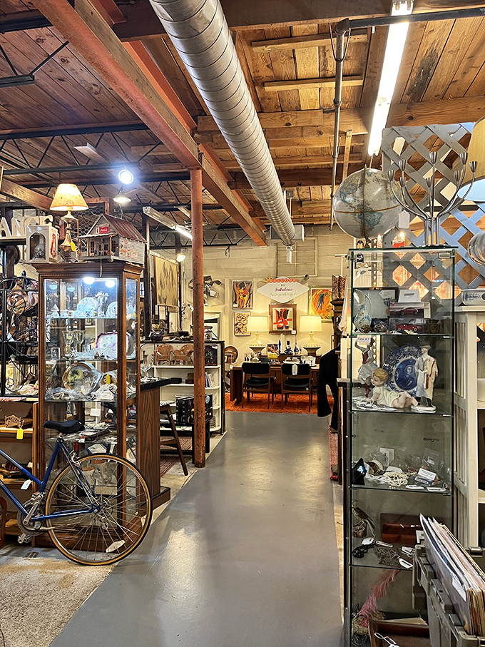 These aisles could tell a thousand stories. Wood beams overhead frame pathways to countless treasures from yesteryear.