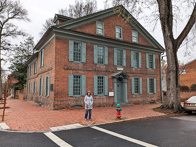 The Amstel House corner view showcases the architectural equivalent of colonial swagger&mdash;where 18th-century design meets 21st-century fire hydrant technology.