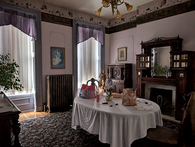 A perfectly preserved Victorian parlor awaits your visit. That fireplace has witnessed conversations spanning three centuries&mdash;imagine the gossip it could share.