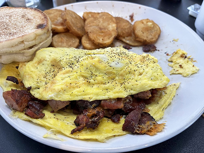 When eggs and bacon hold their annual reunion, this is what happens&mdash;a fluffy embrace of breakfast perfection with potatoes on standby.