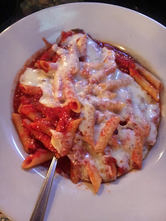 Baked ziti that makes you want to write poetry. The cheese pull alone deserves its own Instagram account.