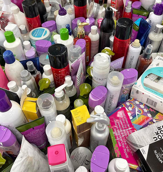Beauty product bonanza! Premium hair and skincare brands jumbled together like a cosmetic treasure chest waiting to be sorted.