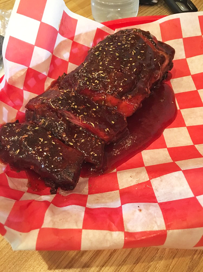 These ribs have the kind of bark that makes tree bark jealous. The spice rub alone deserves its own fan club.