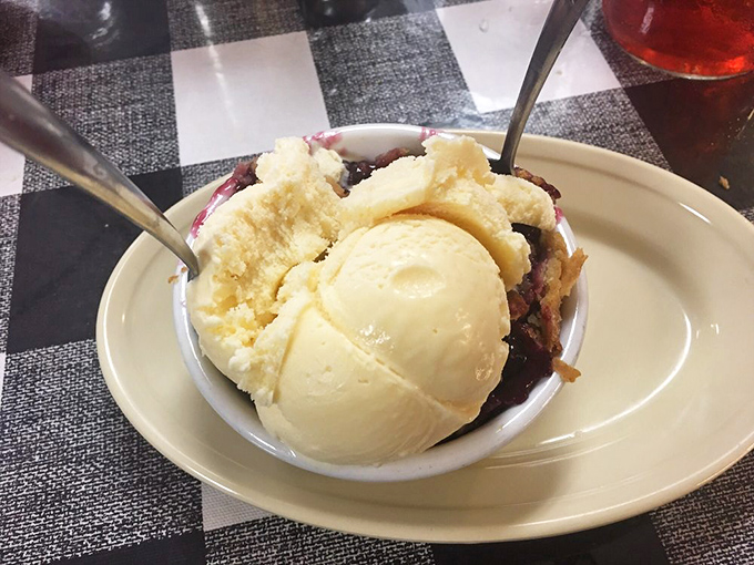 A coffee mug standing guard beside this blackberry cobbler feels like bringing a knife to a gunfight—totally outmatched by the star of the show.