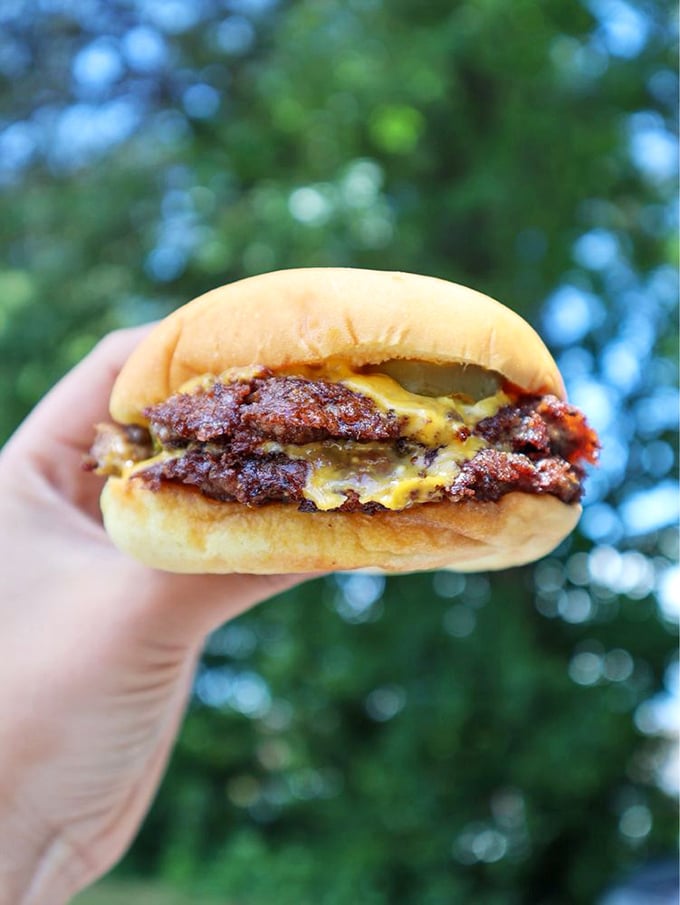 Simple perfection: a burger with those magical crispy edges where the patty meets the griddle. No filter needed when reality looks this delicious.