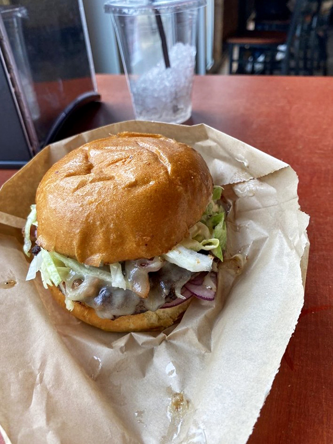 This isn't just a burger&mdash;it's edible architecture. The glistening bun, the melty cheese, the precise layering of ingredients&mdash;Michelangelo would approve.