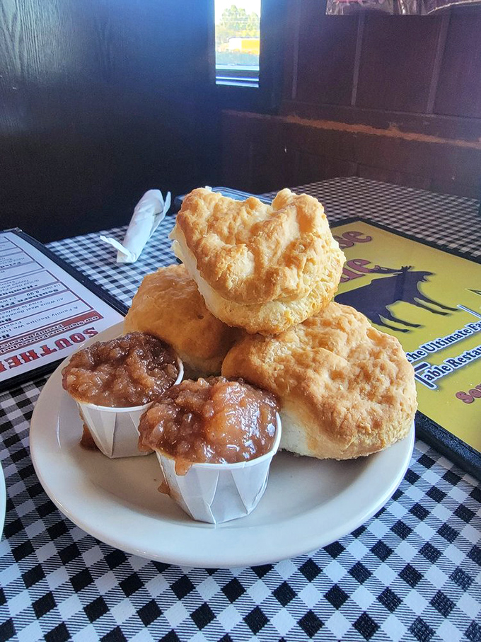 These aren't just biscuits; they're buttery clouds of heaven waiting to be smothered in that cinnamon-kissed apple butter.