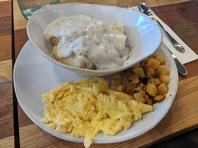 Biscuits and gravy: the Southern diplomat on a Kansas mission. That creamy pepper gravy blanket could make anything taste like comfort.