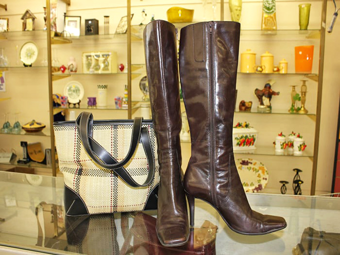 Designer boots and vintage handbags await their second act. Someone's splurge becomes your steal in the accessory section's glass-case gallery.