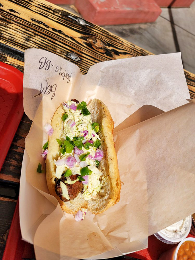 This bratwurst sandwich isn't just lunch&mdash;it's edible history. The purple onions add both color and a zingy counterpoint to the savory sausage.