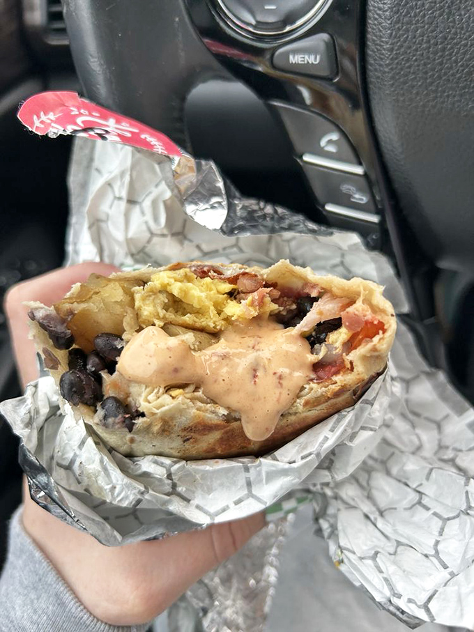 The bacon breakfast burrito, adorned with chipotle cream, turns your car's center console into the finest dining establishment in Raleigh.
