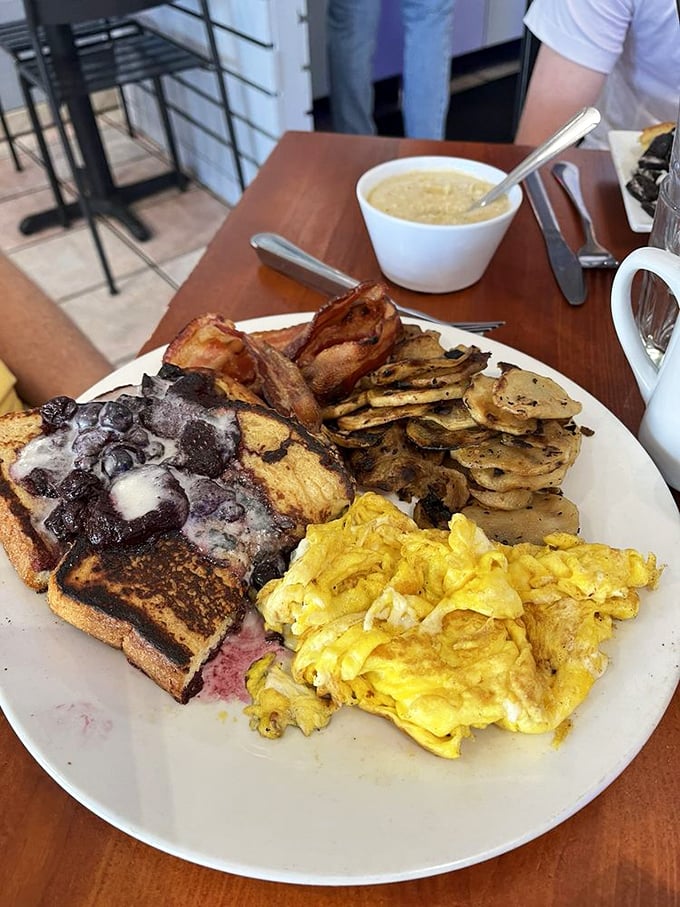 When your breakfast plate looks like this, you know the day ahead has promise. That berry-topped French toast is practically winking at you.