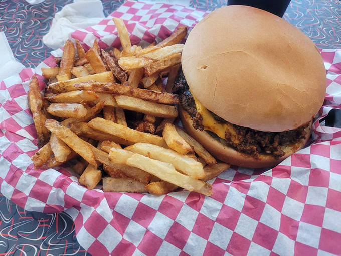 The classic American duo&mdash;burger and fries&mdash;performing their greatest hits on a red and white checkered stage.