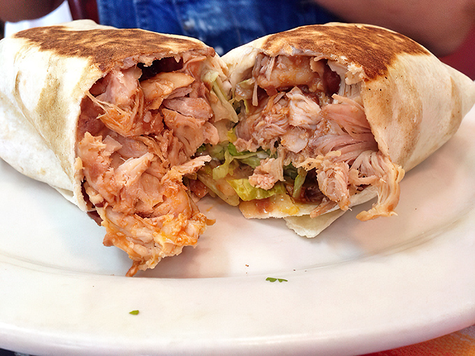 This chicken burrito isn't just dinner&mdash;it's edible architecture. Notice how the rice creates the foundation for that perfectly seasoned pollo.