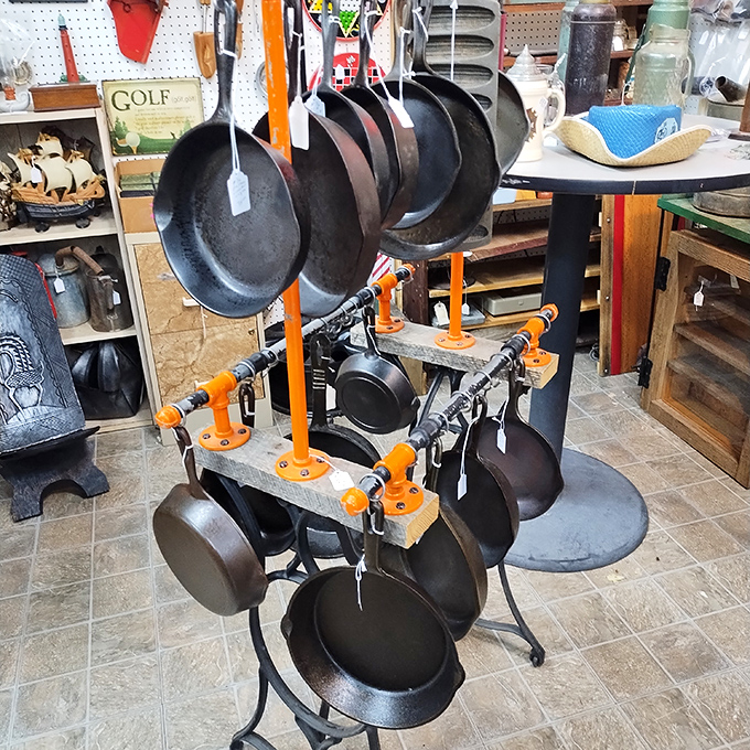 These seasoned cast iron pans have stories to tell&mdash;each one perfectly hung like an art gallery of American cooking history waiting for its next chapter.