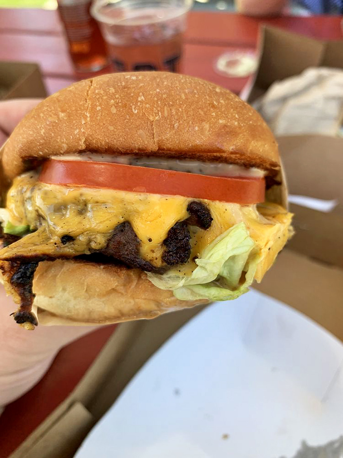 Cheese cascading down a perfectly charred patty&mdash;this burger doesn't just satisfy hunger, it creates memories that haunt your taste buds.