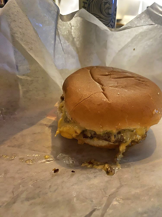 Cheese escaping from its beefy prison like a delicious jailbreak. The evidence of a proper Jucy Lucy is always written in dairy.