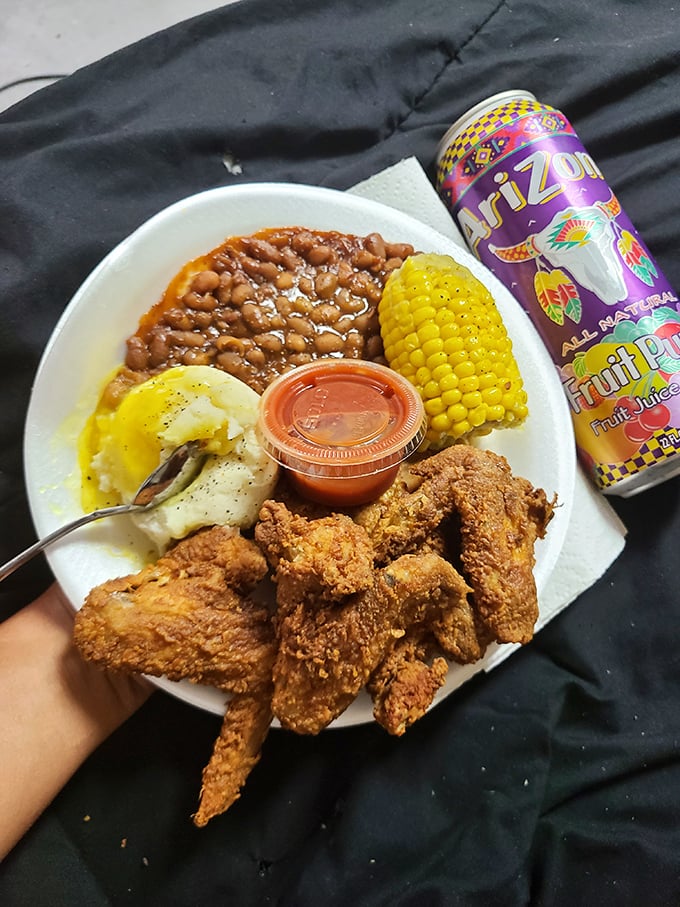 A plate that hits all the comfort food notes&mdash;crispy wings, creamy mashed potatoes, sweet baked beans, and sunshine-yellow corn. 