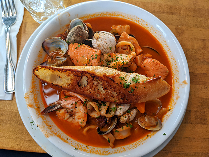 The Fisherman's Cioppino: where clams, mussels, and fish gather for a party in tomato broth that would make Neptune himself request seconds. 
