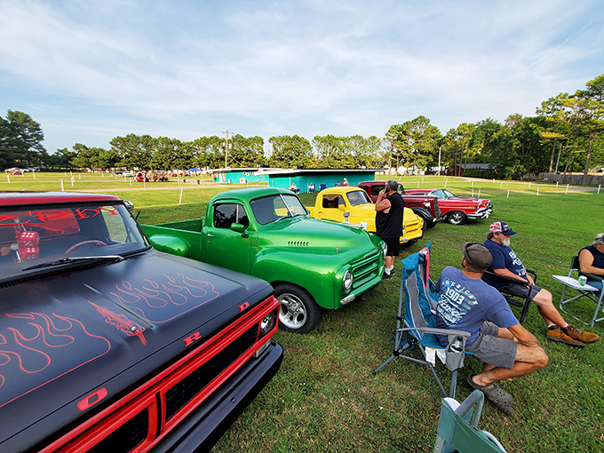 Car enthusiasts bring their colorful classics to the Kenda, creating an impromptu auto show before the feature presentation.