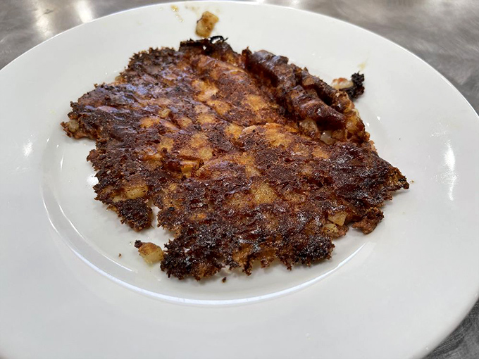 Crispy, savory perfection on a plate. This hash isn't just corned beef &ndash; it's a masterclass in breakfast engineering.