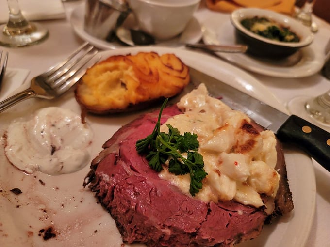 Prime rib crowned with crab imperial&mdash;because sometimes one delicious thing deserves another. Ocean meets pasture in perfect harmony.
