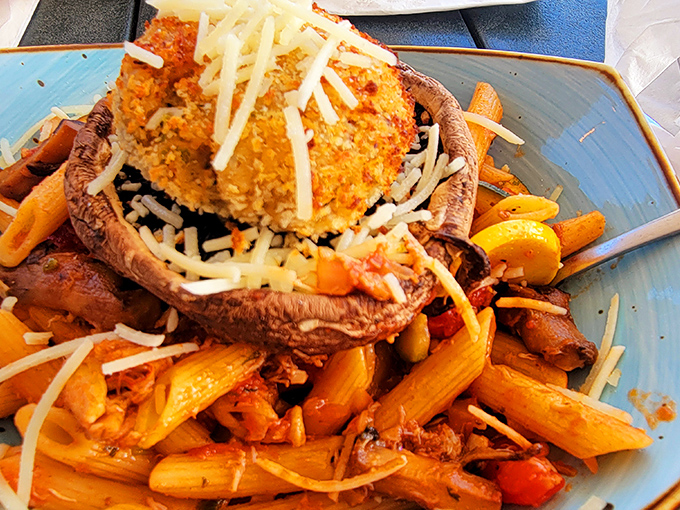 When a crab cake crowns a portobello mushroom atop pasta, it's not dinner&mdash;it's architecture you can eat.