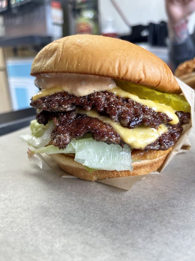 This double cheeseburger doesn't need fancy aioli or artisanal buns—it's confident in its classic, no-nonsense deliciousness.