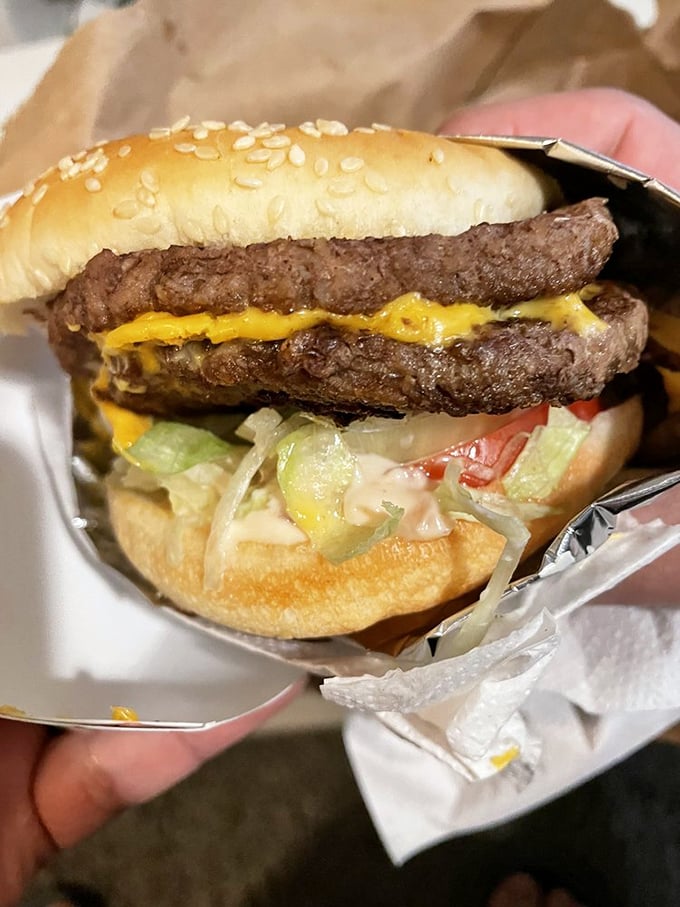 This isn't just a double cheeseburger&mdash;it's a towering monument to beef that requires both hands, several napkins, and zero regrets.