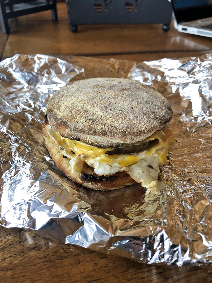 This English muffin breakfast sandwich doesn't need fancy words&mdash;just look at that melty cheese situation happening. Morning perfection.