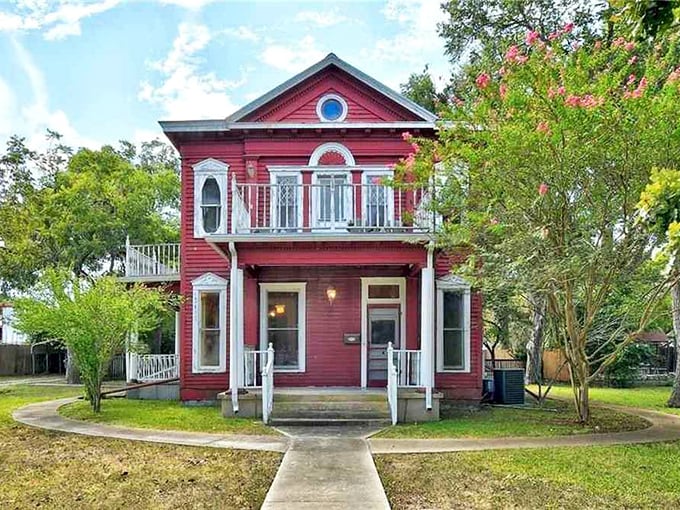 This crimson Victorian beauty seems plucked from a Wes Anderson film—quirky, colorful, and impossible to ignore against Lockhart's blue sky.
